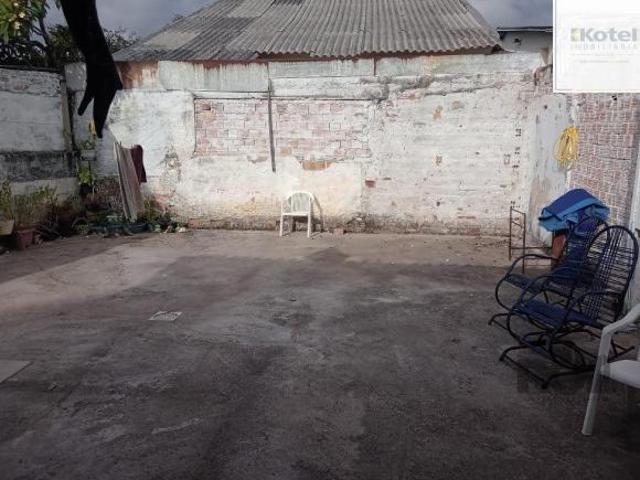 Casa com 2 dormitórios, vaga, amplo pátio, no bairro Santa Rosa de Lima, Poa/RS