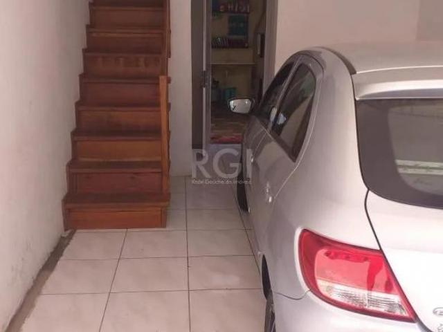 Casa com 2 quartos, banheiro, área de serviço, cozinha, vaga de garagem, no bair
