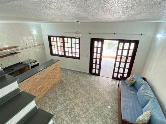 Casa com 2 quartos e área gourmet com churrasqueira Boiçucanga