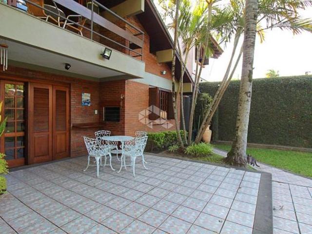 Casa com 309m² e 3 dormitórios no bairro Ipanema em PORTO ALEGRE