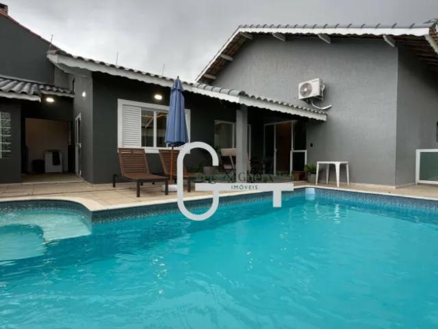 Casa com 3 dormitórios à venda, 247 m² por R$ 900.000,00 Parque D'Aville Residencial Peruíbe/SP
