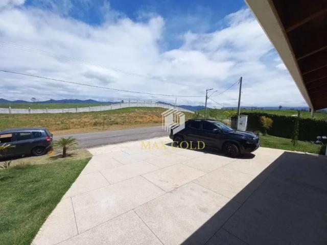 Casa com 3 dormitórios à venda, 550 m² por R$ 2.900.000,00 Condomínio Village da Serra Tremembé/
