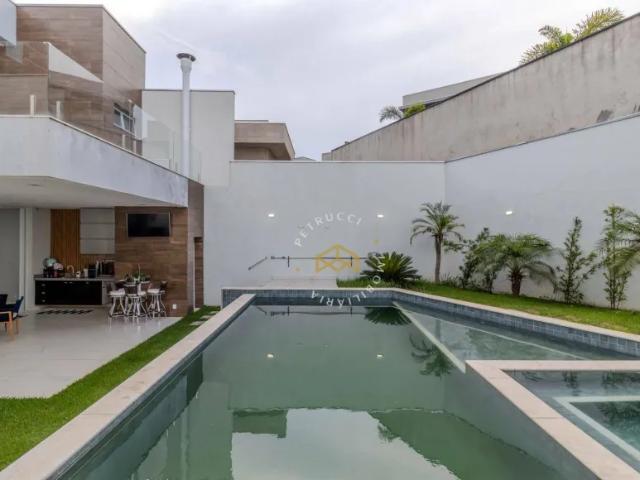 Casa com 3 dormitórios, 460 m² venda por R$ 2.950.000,00 ou aluguel por R$ 18.347,32 Swiss Park