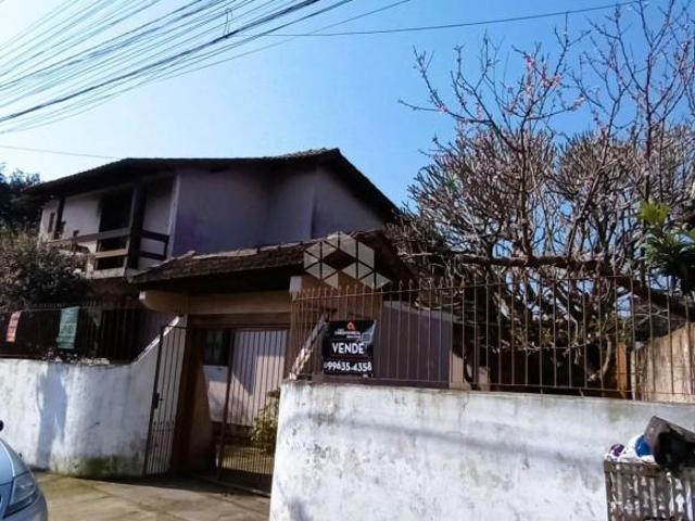 Casa com 3 dormitórios no bairro Tarumã em Viamão