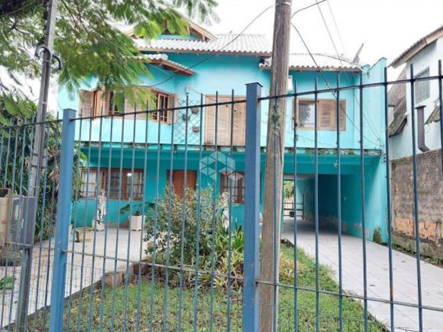 Casa com 3 dormitórios no Bairro Partenon em Porto Alegre