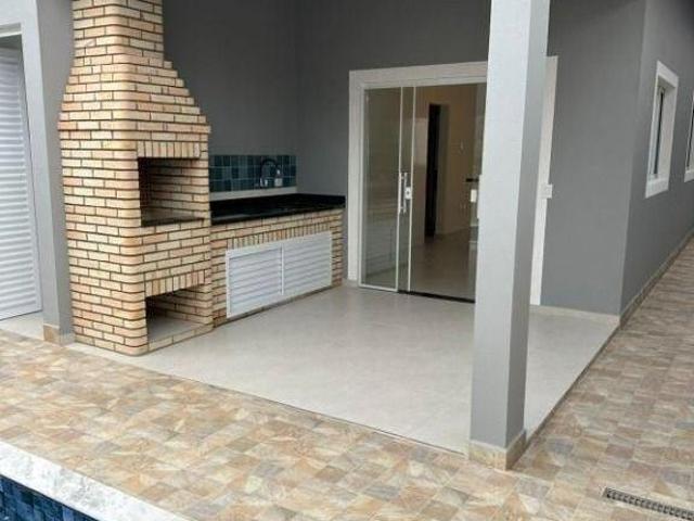 Casa com 3 dormitórios à venda, 108 m² por R$ 699.000,00 Itaguaí Mongaguá/SP