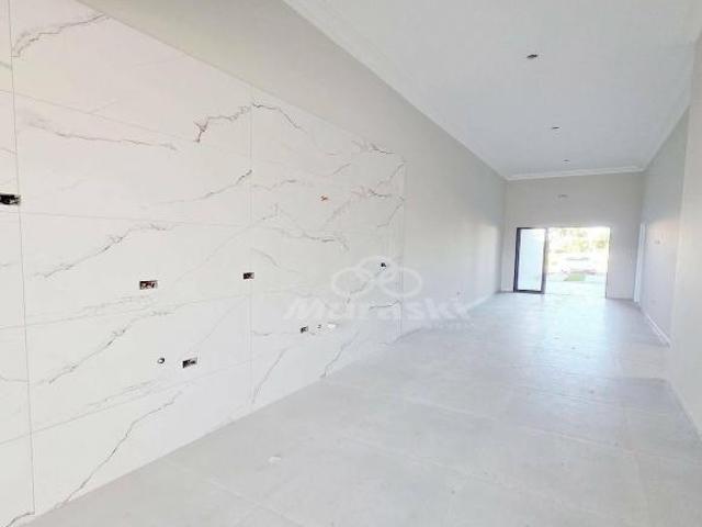 Casa com 3 dormitórios à venda, 109 m² por R$ 590.000,00 Coroados Guaratuba/PR