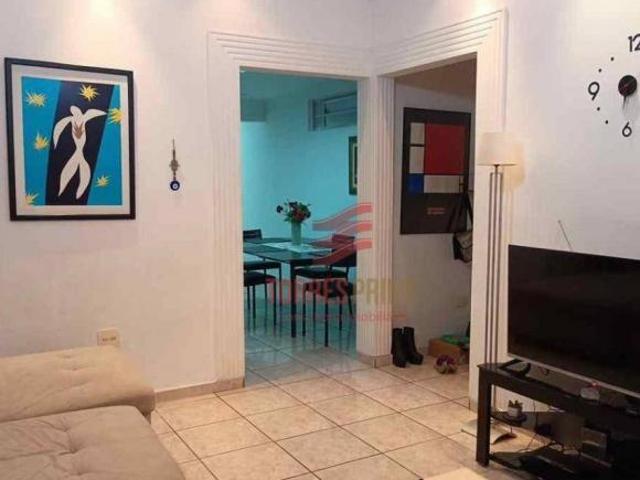 Casa com 3 dormitórios à venda, 109 m² por R$ 880.000,00 Aparecida Santos/SP