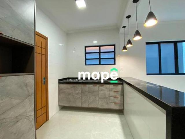 Casa com 3 dormitórios à venda, 100 m² por R$ 1.065.000