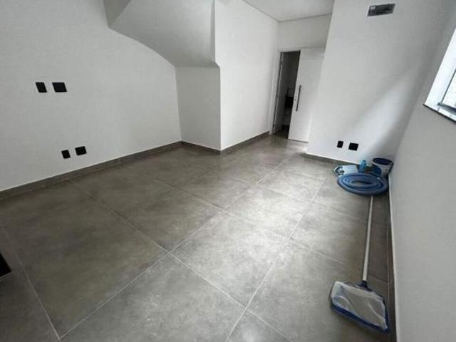 Casa com 3 dormitórios à venda, 100 m² por R$ 1.383.000,00 Aparecida Santos/SP
