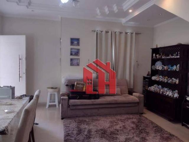 Casa com 3 dormitórios à venda, 101 m² por R$ 1.700.000,00 Aparecida Santos/SP