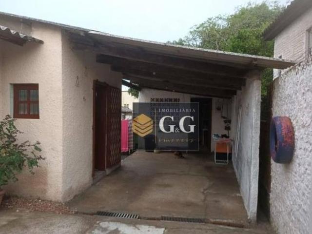 Casa com 3 dormitórios à venda, 102 m² por R$ 375.000 Tarumã Viamão/RS