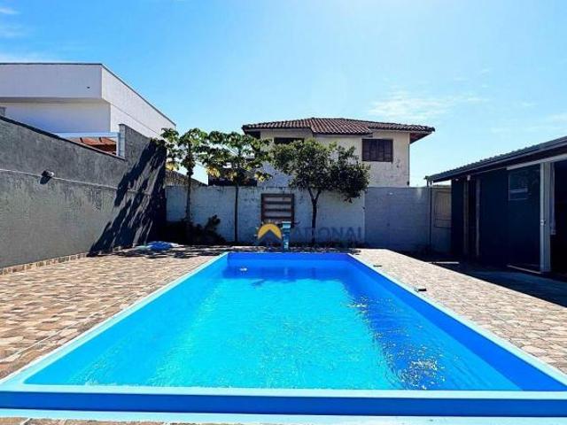 Casa com 3 dormitórios à venda, 102 m² por R$ 620.000,00 Coroados Guaratuba/PR