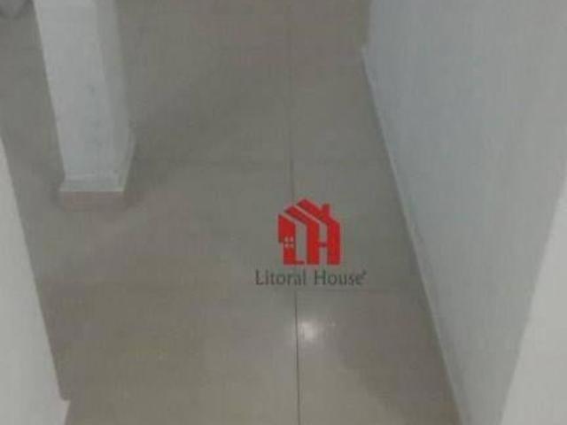 Casa com 3 dormitórios à venda, 114 m² por R$ 855.000,00 Ponta da Praia Santos/SP