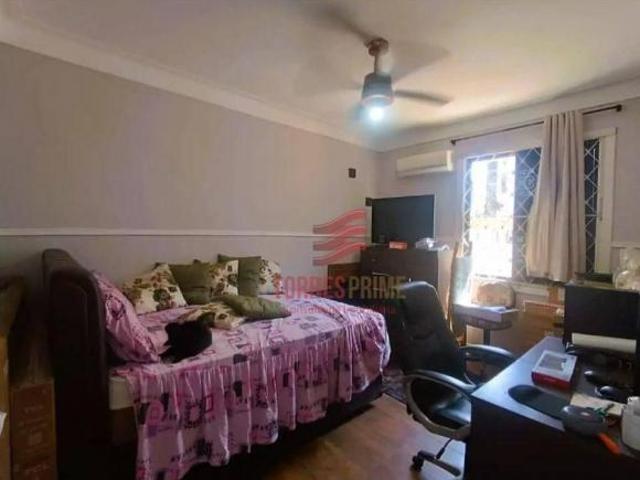 Casa com 3 dormitórios à venda, 114 m² por R$ 890.000,00 Encruzilhada Santos/SP