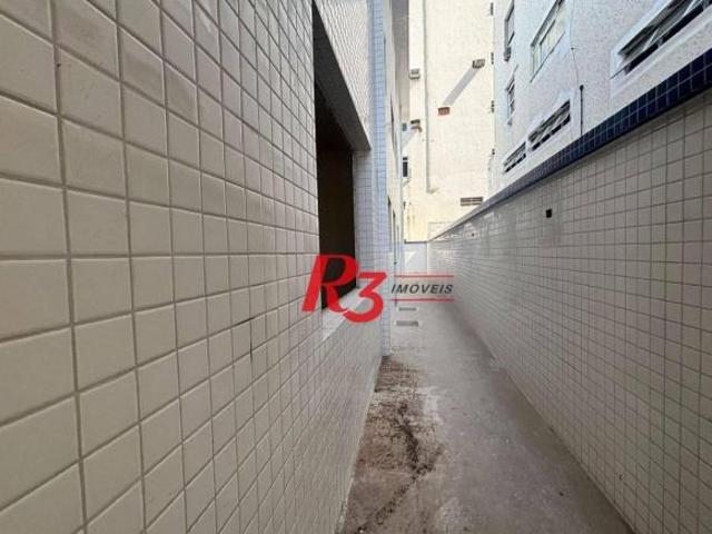 Casa com 3 dormitórios à venda, 118 m² por R$ 1.020.000,00 Aparecida Santos/SP