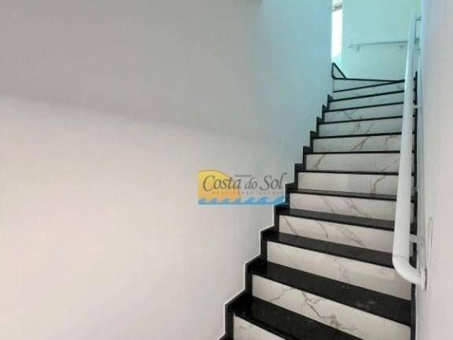 Casa com 3 dormitórios à venda, 119 m² por R$ 600.000,00 Tude Bastos Praia Grande/SP