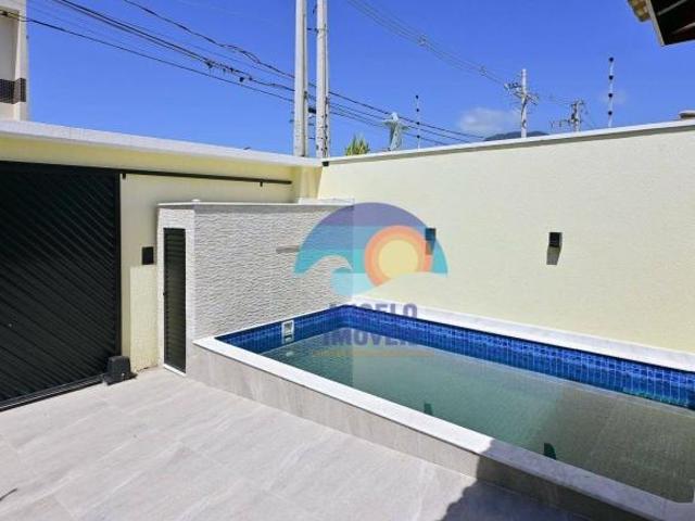 Casa com 3 dormitórios à venda, 110 m² por R$ 500.000,00 Parque D&apos Aville Residencial Peruíbe/SP