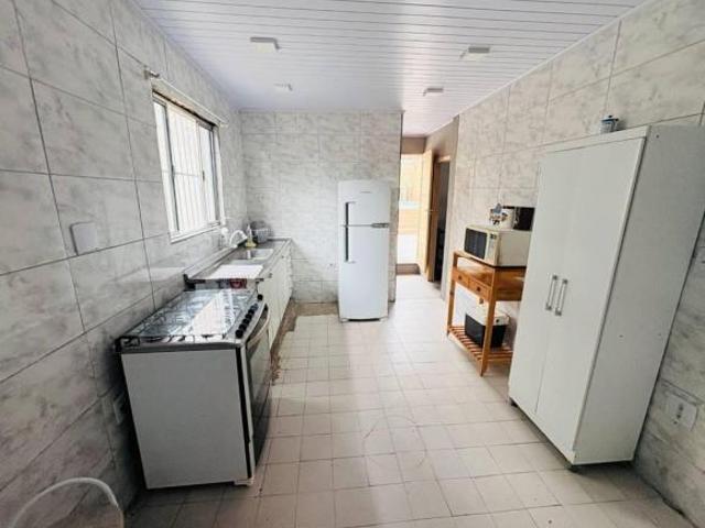 Casa com 3 dormitórios à venda, 111 m² por R$ 890.000 Jardim Anhangüera Praia Grande/SP