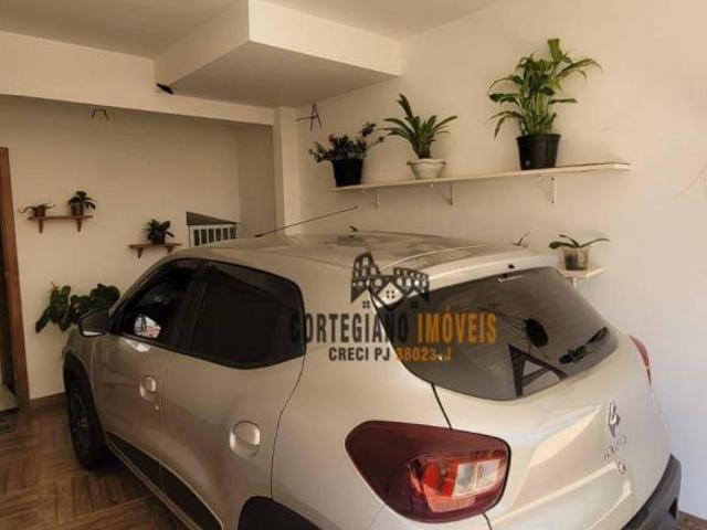 Casa com 3 dormitórios à venda, 112 m² por R$ 575.000,00 Macuco Santos/SP