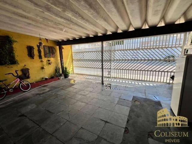 Casa com 3 dormitórios à venda, 112 m² por R$ 700.000,00 Canto do Forte Praia Grande/SP