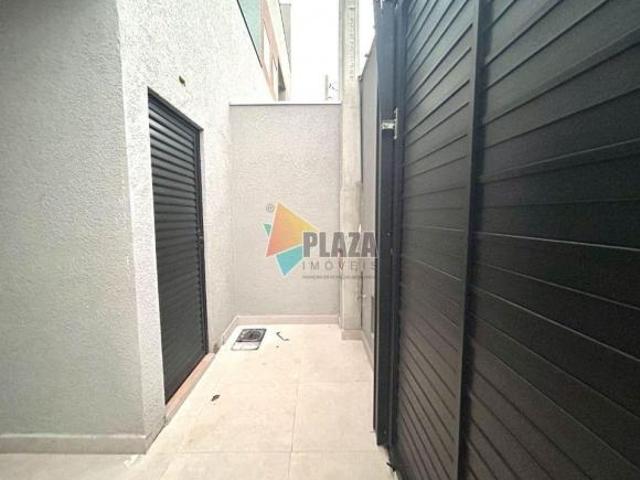 Casa com 3 dormitórios à venda, 113 m² por R$ 600.000,00 Vila Assunção Praia Grande/SP