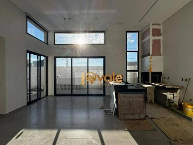 Casa com 3 dormitórios à venda, 125 m² por R$ 1.270.000,00 Condomínio Reserva Aruanã São José do