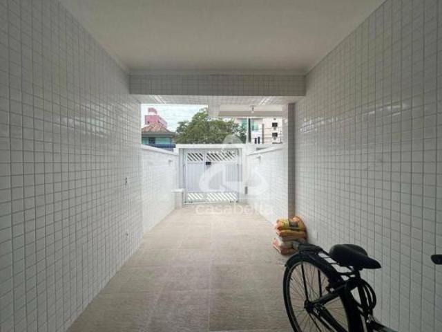 Casa com 3 dormitórios à venda, 126 m² por R$ 950.000,00 Aparecida Santos/SP