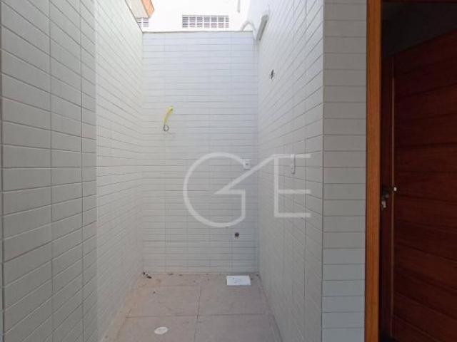 Casa com 3 dormitórios à venda, 129 m² por R$ 850.000,00 Aparecida Santos/SP