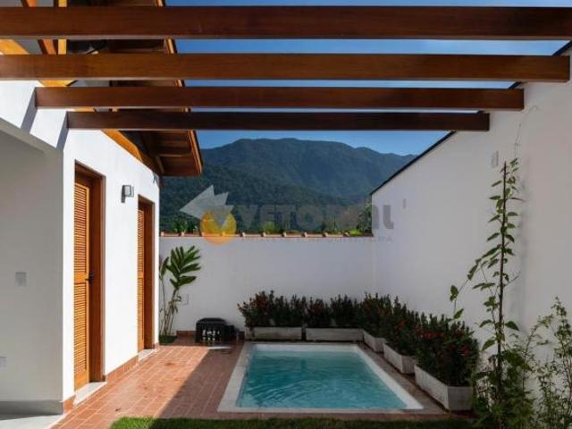 Casa com 3 dormitórios à venda, 120 m² por R$ 1.060.000,00 Massaguaçu Caraguatatuba/SP