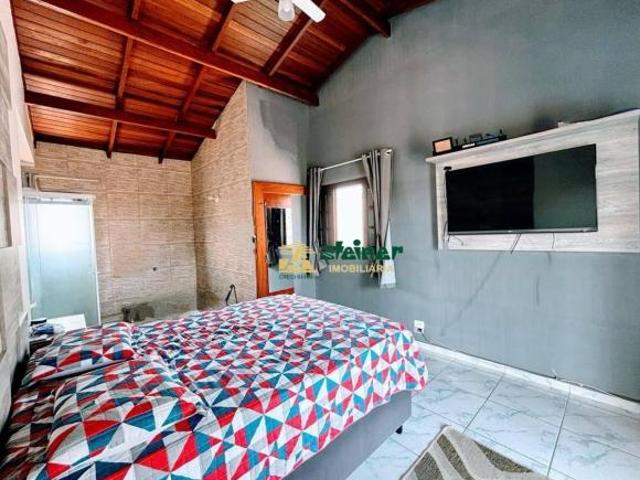 Casa com 3 dormitórios à venda, 120 m² por R$ 750.000,00 Pontal de Santa Marina Caraguatatuba/SP