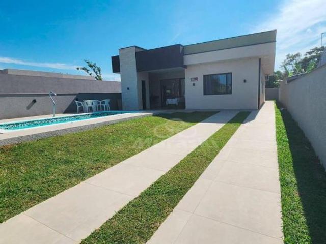Casa com 3 dormitórios à venda, 121 m² por R$ 790.000,00 Coroados Guaratuba/PR