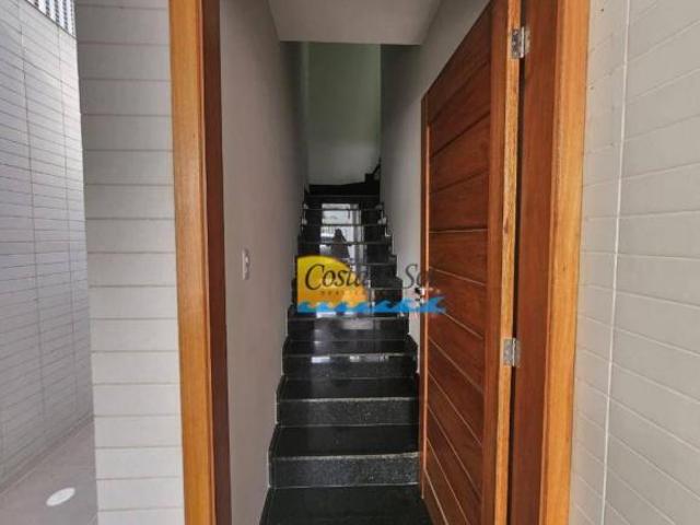 Casa com 3 dormitórios à venda, 134 m² por R$ 890.000,00 Aparecida Santos/SP