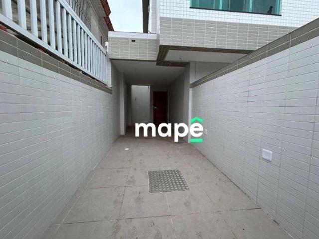 Casa com 3 dormitórios à venda, 134 m² por R$ 890.000,00 Aparecida Santos/SP