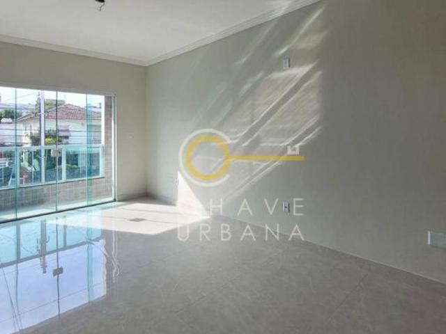 Casa com 3 dormitórios à venda, 134 m² por R$ 944.000,00 Aparecida Santos/SP