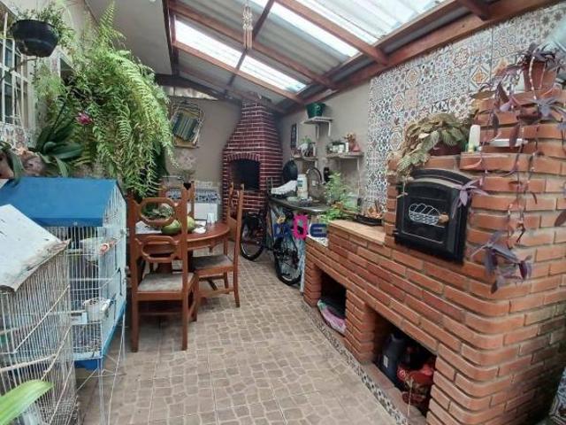 Casa com 3 dormitórios à venda, 135 m² por R$ 600.000,00 Balneário Pires Praia Grande/SP