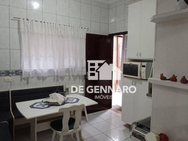 Casa com 3 dormitórios à venda, 135 m² por R$ 650.000 Vilamar Praia Grande/SP