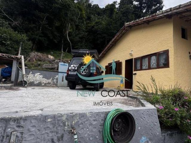 Casa com 3 dormitórios à venda, 135 m² por R$ 900.000,00 Cigarras São Sebastião/SP