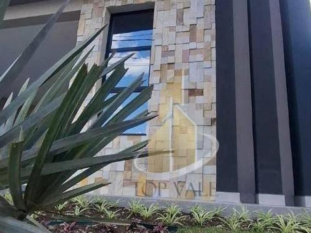 Casa com 3 dormitórios à venda, 136 m² por R$ 938.000,00 Condominio Residencial Malibu Caçapava/