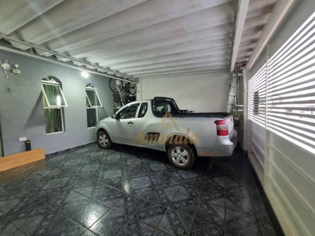 Casa com 3 dormitórios à venda, 137 m² por R$ 465.000,00 Residencial Vale das Nogueiras American