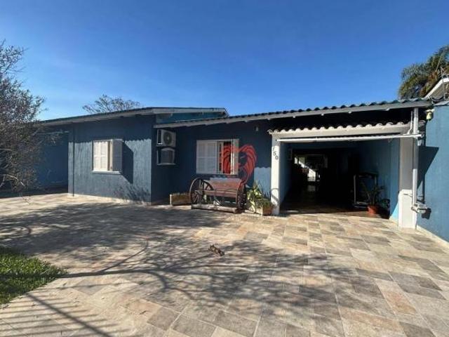 Casa com 3 dormitórios à venda, 137 m² por R$ 744.600,00 Monte Belo Gravataí/RS
