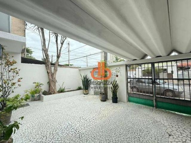 Casa com 3 dormitórios à venda, 130 m² por R$ 790.000,00 Ponta da Praia Santos/SP
