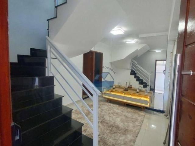 Casa com 3 dormitórios à venda, 130 m² por R$ 900.000,00 Estuário Santos/SP