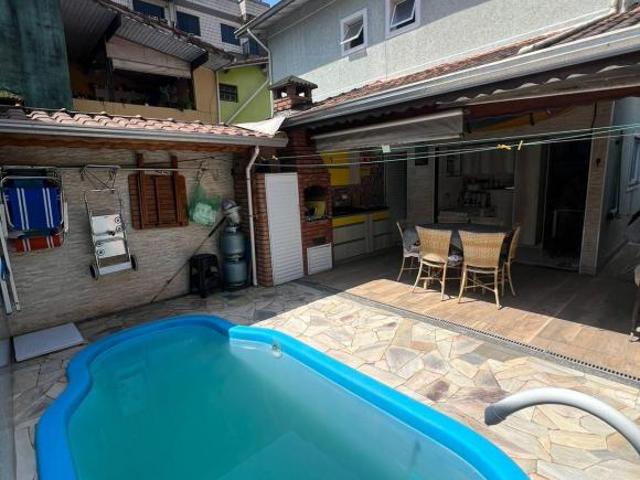 Casa com 3 dormitórios à venda, 130 m² Tupi Praia Grande/SP