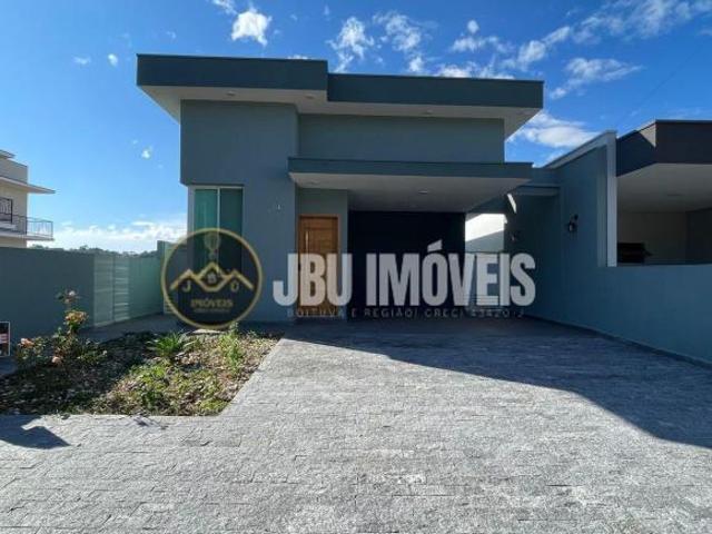 Casa com 3 dormitórios à venda, 130m² por R$ 790.000,00 Condomínio Tropicália Gar