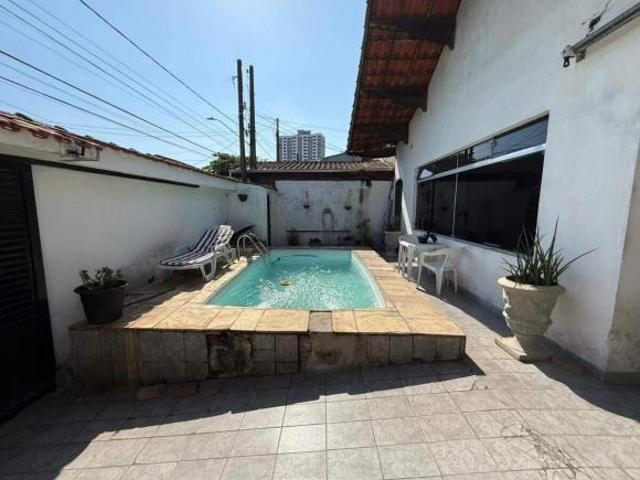 Casa com 3 dormitórios à venda, 132 m² por R$ 1.200.000,00 Boqueirão Praia Grande/SP