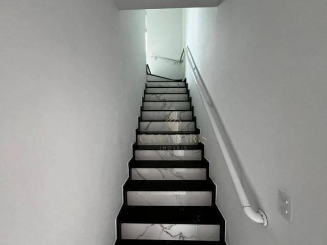 Casa com 3 dormitórios à venda, 133 m² por R$ 680.000,00 Tude Bastos Praia Grande/SP