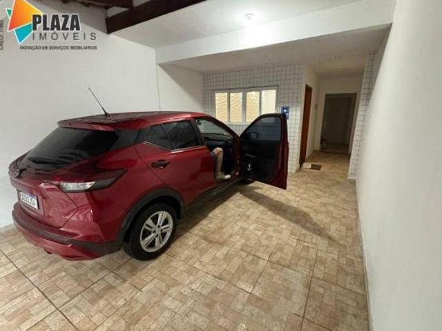Casa com 3 dormitórios à venda, 144 m² por R$ 990.000,00 Boqueirão Praia Grande/SP