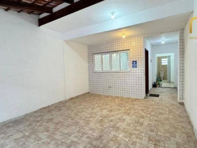 Casa com 3 dormitórios à venda, 144 m² por R$ 990.000,00 Boqueirão Praia Grande/SP