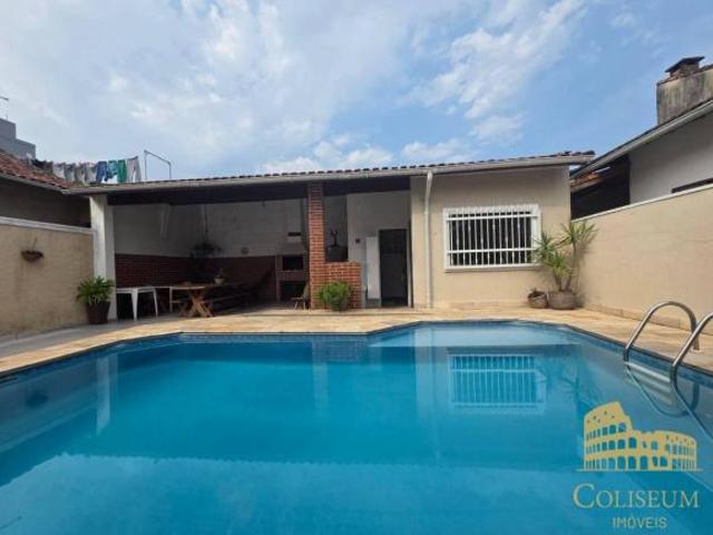 Casa com 3 dormitórios à venda, 145 m² por R$ 980.000,00 Vila Caiçara Praia Grande/SP
